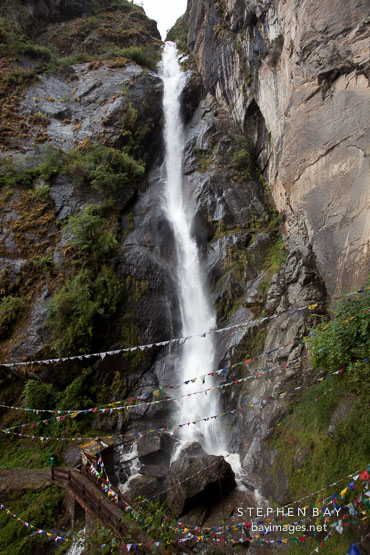 Photo: The Shelkar Zar (waterfall) streams holy water. Paro Valley, Bhutan.